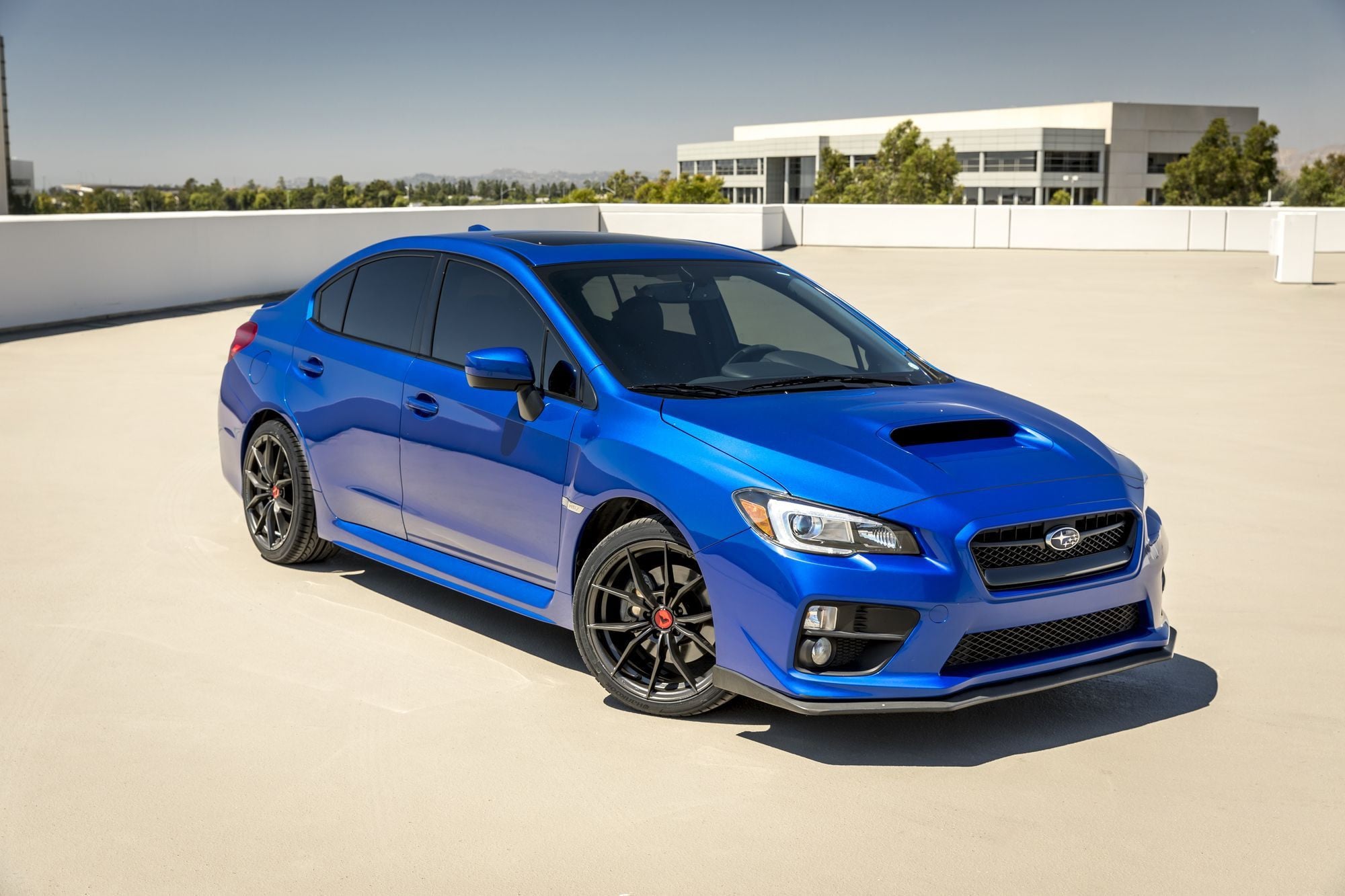 Electric Blue Subaru WRX Sitting on Vorsteiner Wheels | CARiD.com Gallery