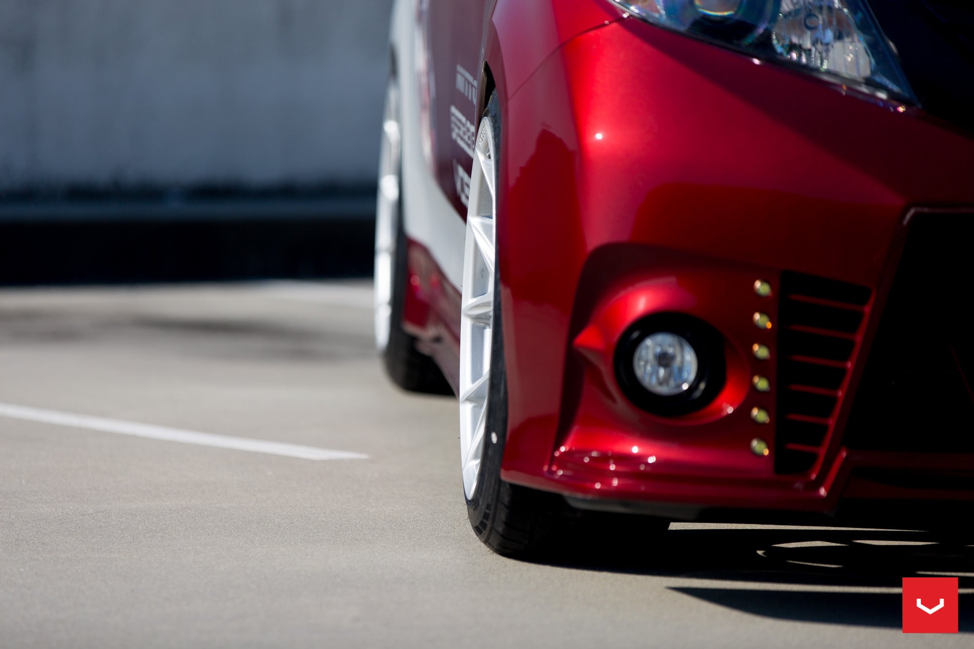 Red Debadged Toyota Sienna on Vossen Rims | CARiD.com Gallery