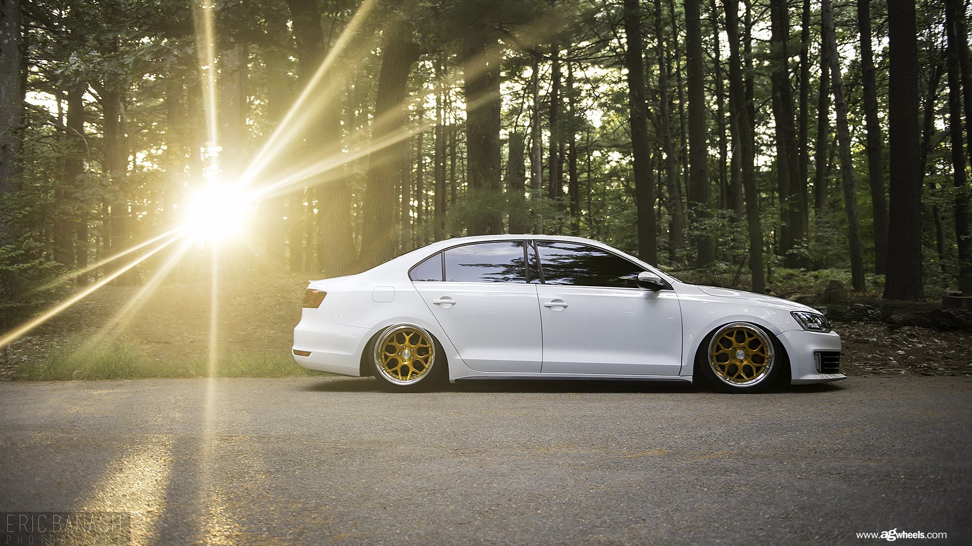 White VW Jetta Rocking a Set of Gold Avant Garde Wheels | CARiD.com Gallery