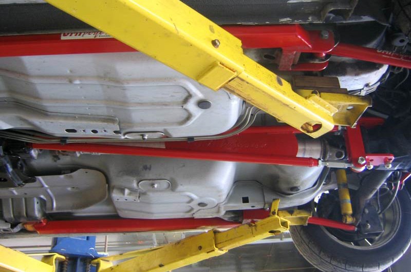 UMI Performance® 2205-R - Adjustable Transmission Mounted Torque Arm